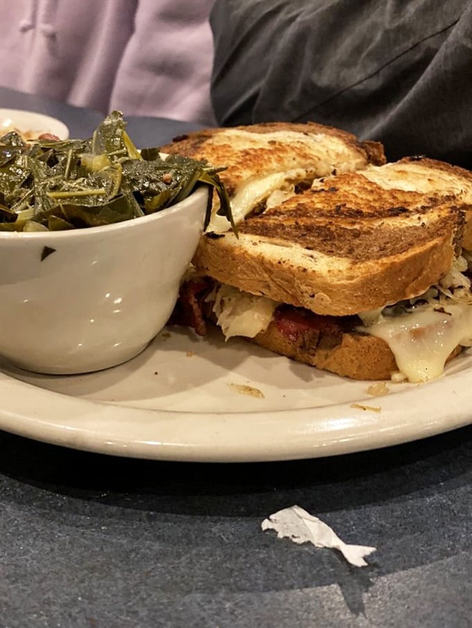 A proper Reuben requires proper sides. These collard greens aren't just vegetables; they're an edible history lesson in Southern cooking traditions.