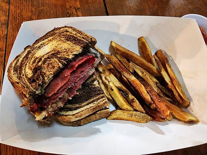 The Reuben doesn't need to show off &ndash; perfectly grilled marble rye, tender corned beef, and just the right balance of Swiss and sauerkraut.