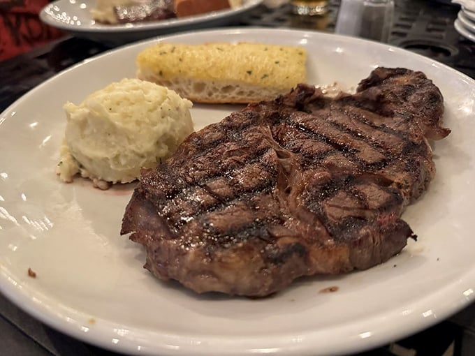 Grill marks that deserve their own Instagram account. This ribeye has the kind of sear that makes vegetarians question their life choices.