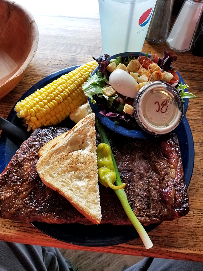 When barbecue gets the full treatment: ribs with the perfect "bark," buttery corn, and a salad that makes you feel virtuous while diving into meat heaven.