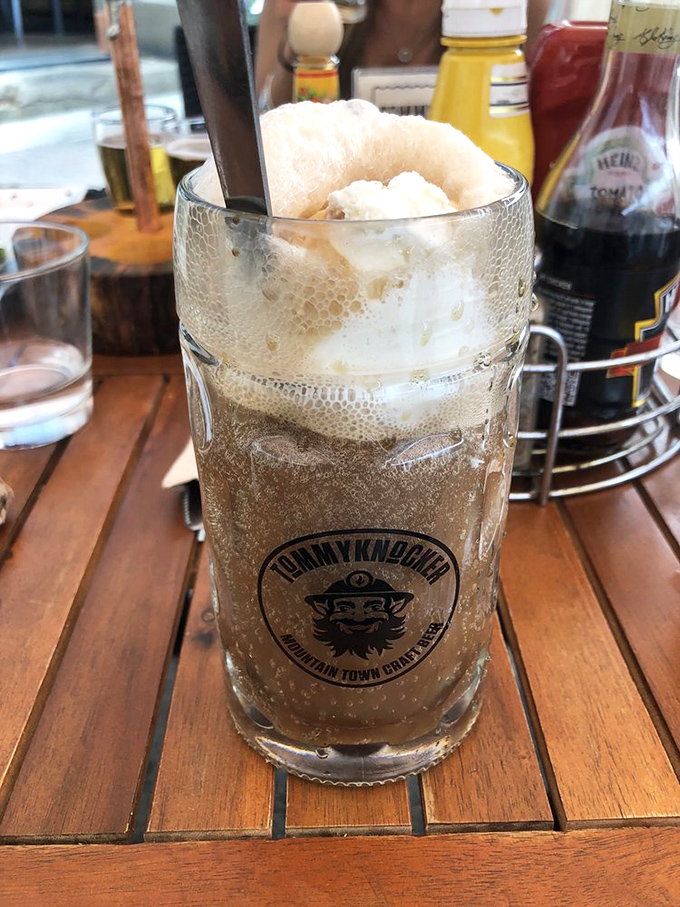 The root beer float isn't just dessert, it's performance art. That beautiful collision of creamy vanilla ice cream and spicy root beer creates a foamy masterpiece worth the drive.