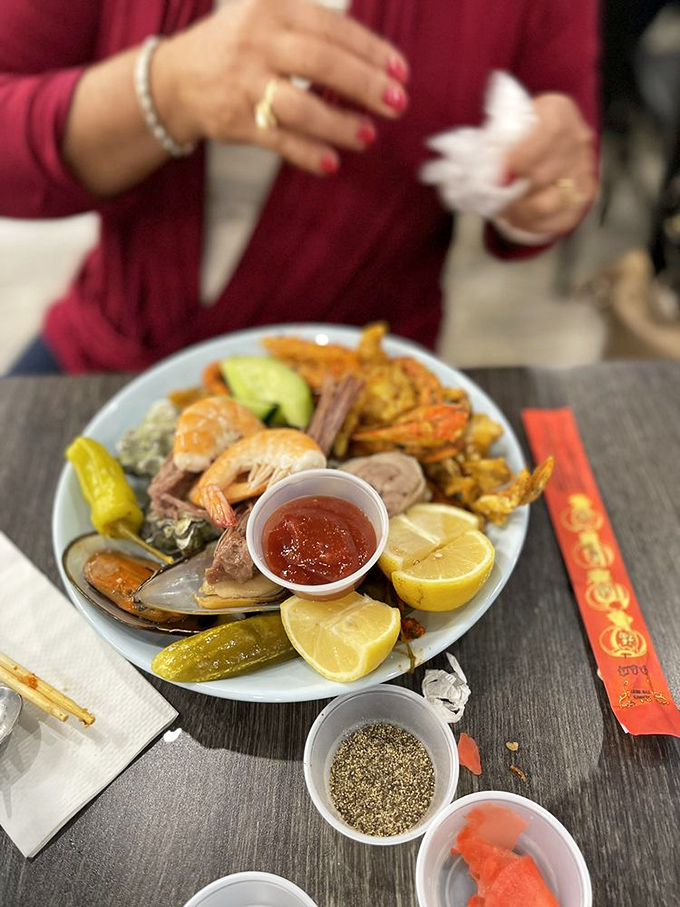 The seafood plate that launched a thousand return visits. Those shrimp aren't just calling your name&mdash;they're writing love sonnets to your appetite.