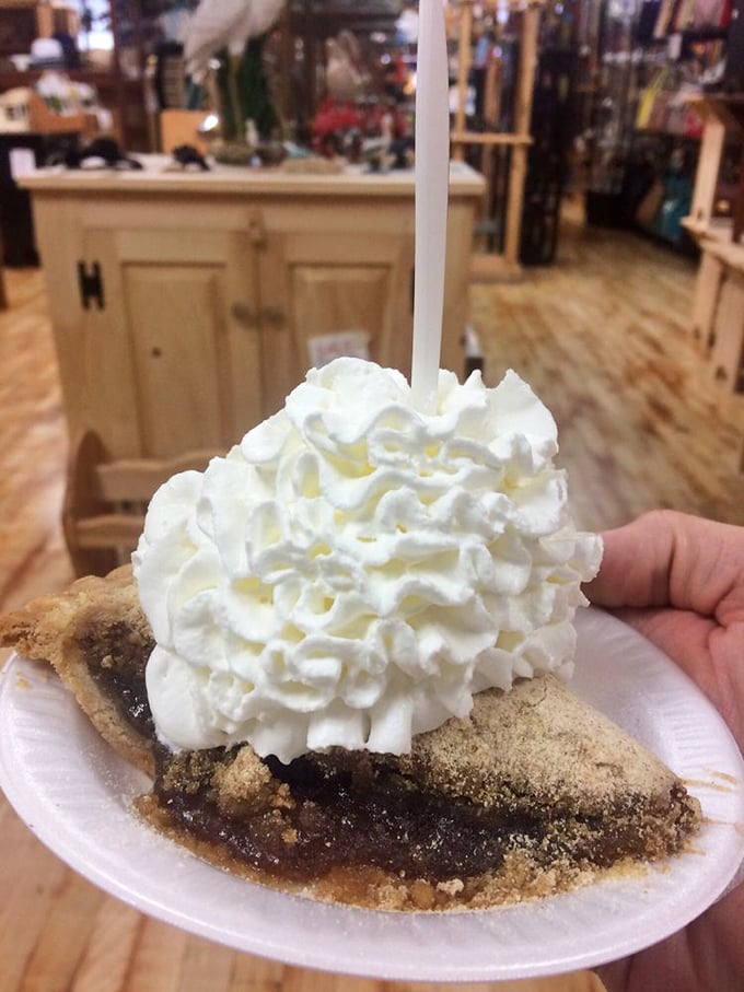 The classic shoo-fly pie in its natural habitat&mdash;a paper plate, ready for consumption. That crumbly top and gooey bottom layer are Pennsylvania's gift to dessert. 