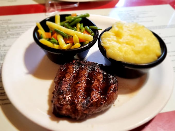 Size isn't everything! This petite powerhouse of a steak proves that great things come in smaller packages, especially when paired with colorful veggies and creamy mashed potatoes.