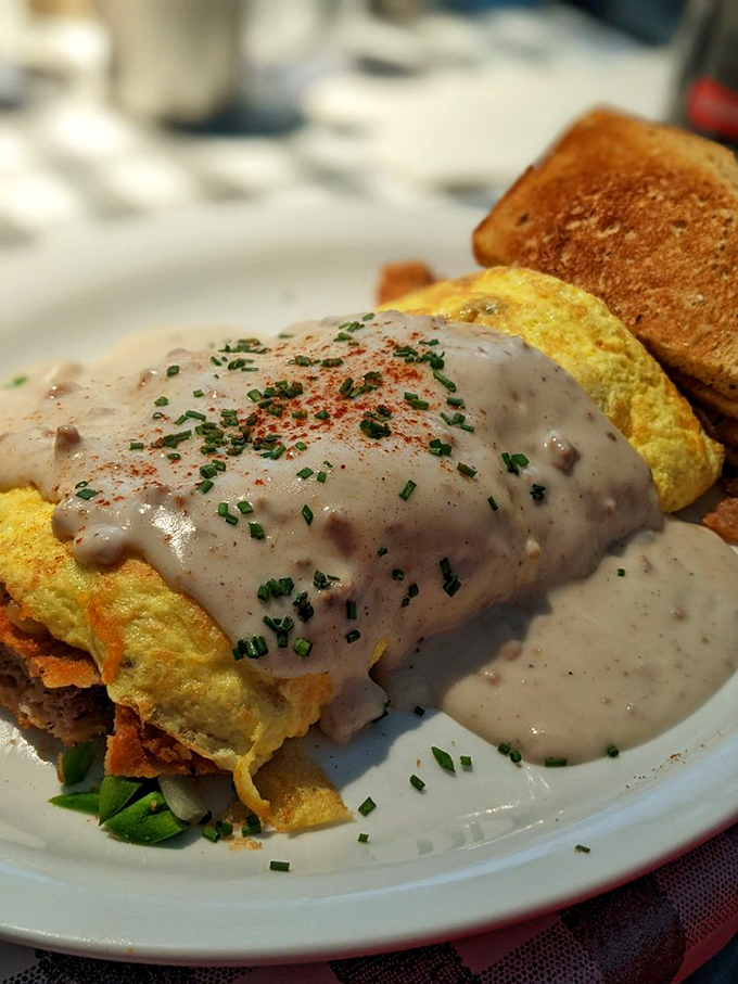 This isn't just breakfast&mdash;it's an architectural masterpiece of eggs, gravy, and chives that makes you question why we don't eat this way every day.