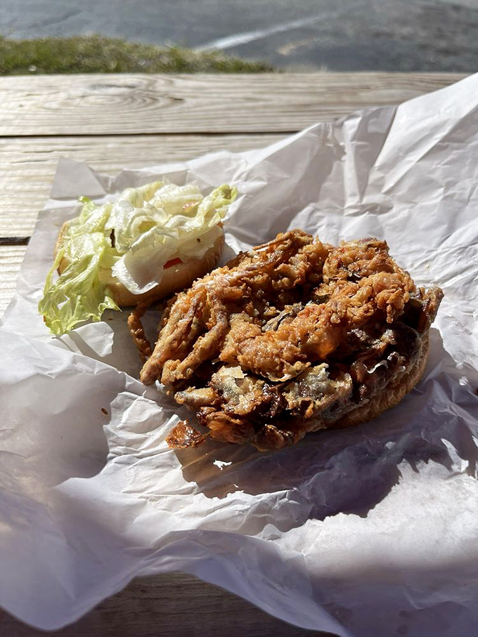 A soft shell crab sandwich that deserves its own fan club. This isn't just lunch&mdash;it's a coastal rite of passage with a side of coleslaw.
