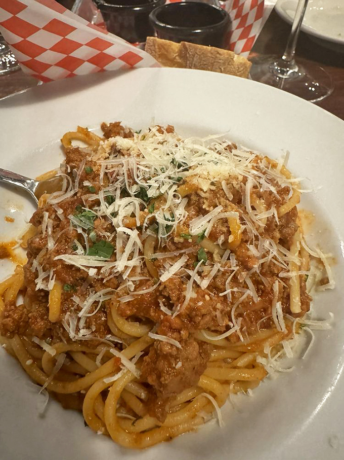 Bolognese with a blizzard of Parmesan snow on top. The kind of meaty, hearty dish that makes you want to hug whoever made it.