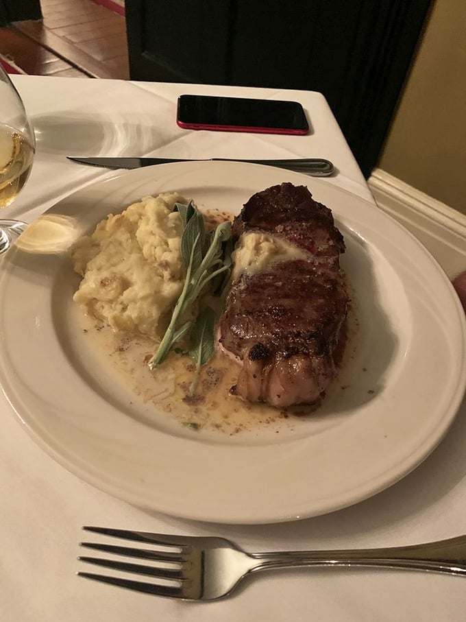 The kind of steak that makes you consider proposing... to the chef. Perfectly seared beef alongside cloud-like mashed potatoes in a pool of silky sauce.