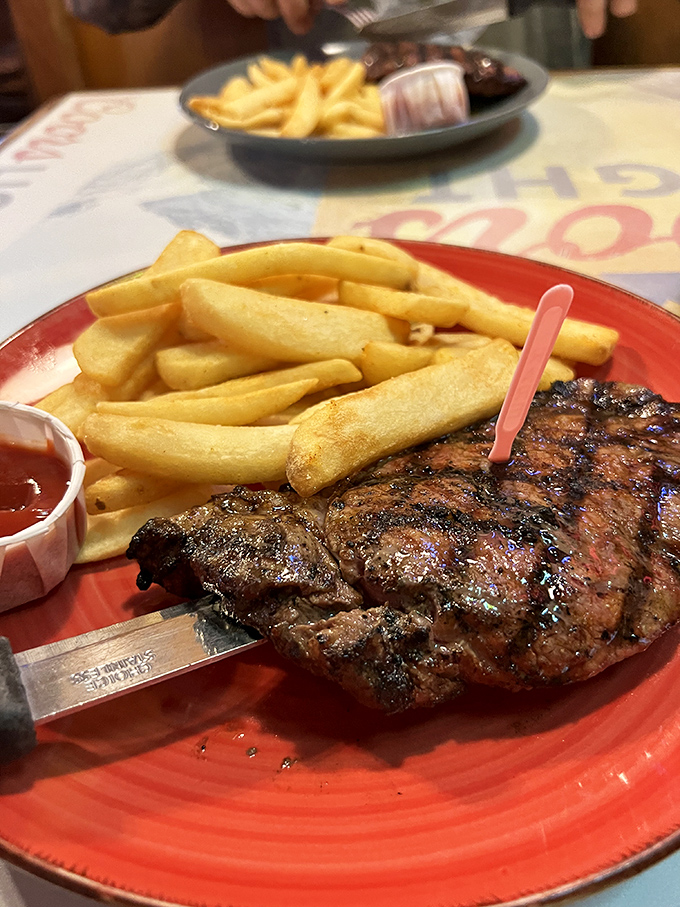 When your steak arrives with those textbook grill marks and golden fries, you know you've made a life choice you won't regret. 