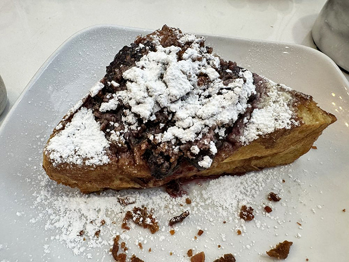 This isn't just French toast; it's a chocolate-topped masterpiece that makes you question why we don't eat dessert for breakfast more often.