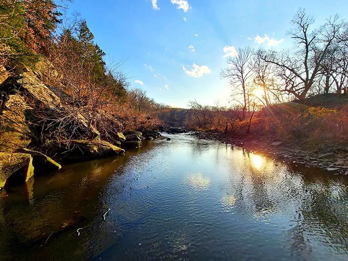 The golden hour transforms Sand Creek into liquid amber. Sunsets like this make even scrolling through work emails seem like a crime.