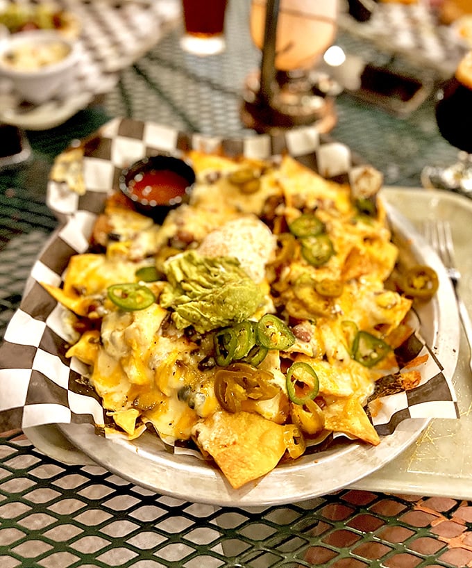 These nachos aren't playing around. Loaded with jalape&ntilde;os, cheese, and guacamole, they're what your childhood nachos dreamed of becoming when they grew up.