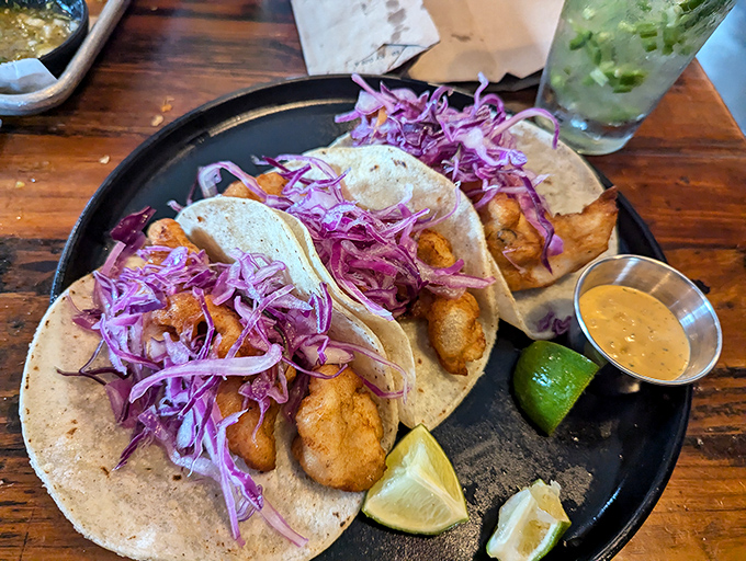 Crispy battered fish meets purple cabbage in a color palette that's as striking as the flavors. Art you can eat!