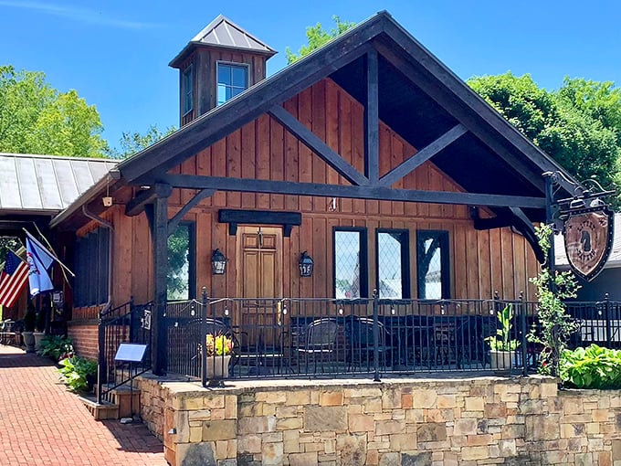 This wooden cabin with stone foundation houses The Livery Tavern, where Appalachian ingredients meet upscale preparation in historic surroundings.