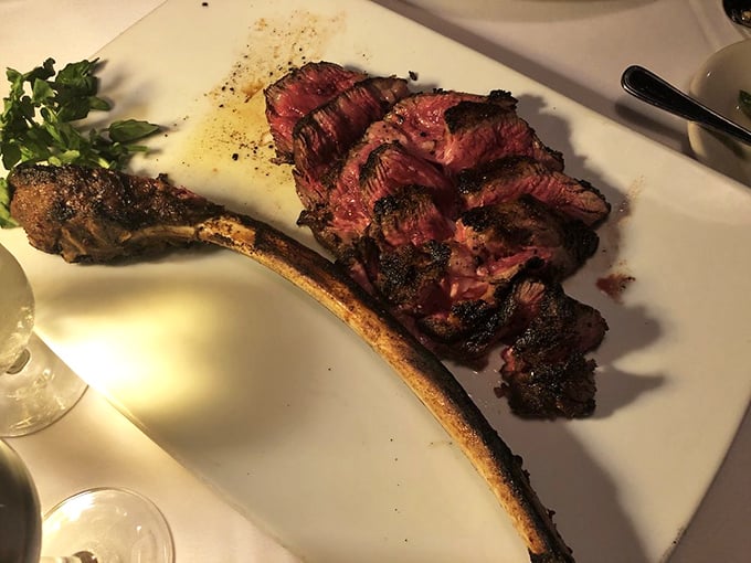 The tomahawk steak arrives like a carnivorous work of art &ndash; that bone extending dramatically as if to say, "Yes, I'm worth every penny."