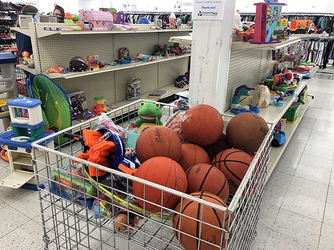Basketball heaven meets toy paradise. That bin of sports equipment isn't just merchandise&mdash;it's future backyard tournaments and playground legends waiting to happen.