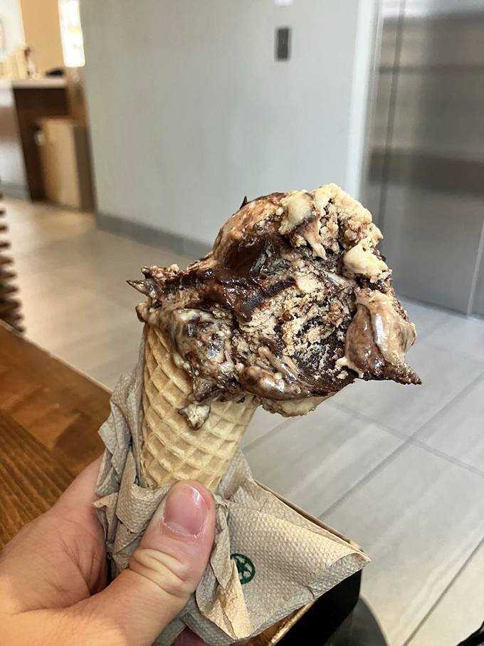 The waffle cone jacket is merely gift wrapping for the real star: ice cream with ribbons of chocolate weaving through like a delicious road map.