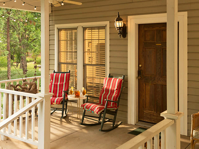 The Willow Wood Cottage's private porch—where morning coffee tastes better and smartphone notifications mysteriously seem less important.