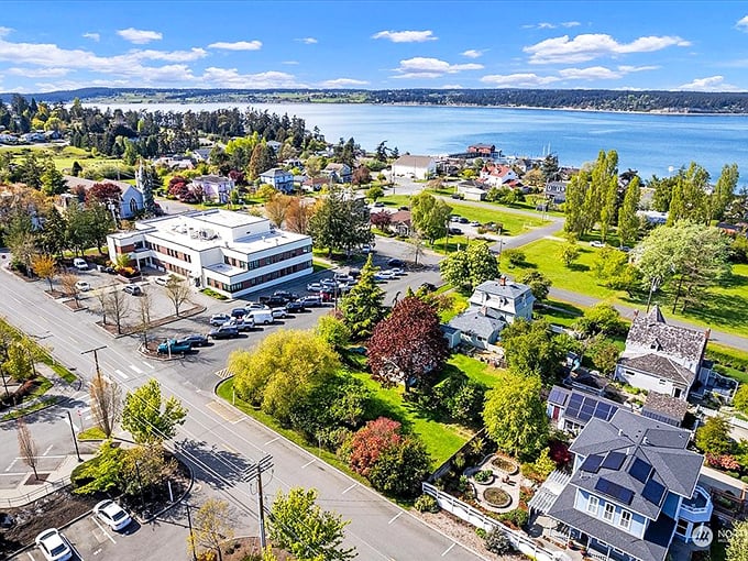 From above, Coupeville reveals its perfect positioning&mdash;nestled between rolling green hills and the shimmering waters of Penn Cove.