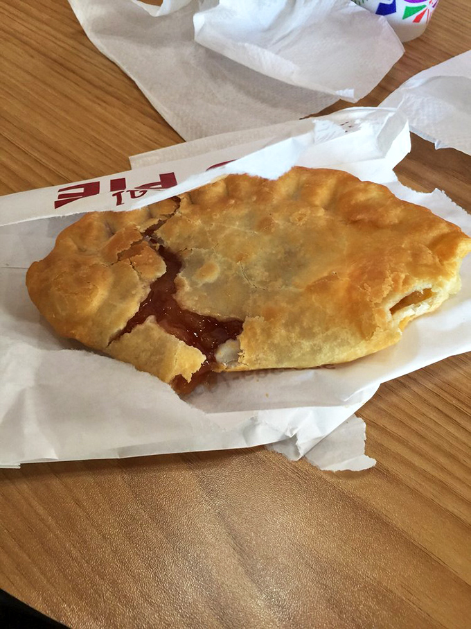 Golden, flaky, and just waiting to reveal its apple-filled secrets. The kind of handheld perfection that makes road trips worthwhile.