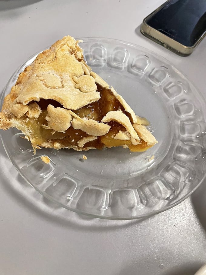 Apple pie so honest and straightforward it could run for office. The glistening filling peeks through a crust that's achieved pastry perfection.