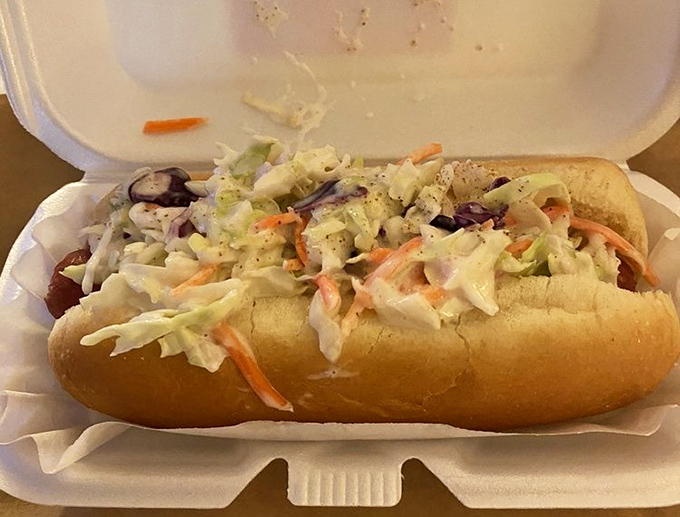 The Atlanta Dog comes dressed for success with a mountain of fresh coleslaw. It's Southern comfort in handheld form.