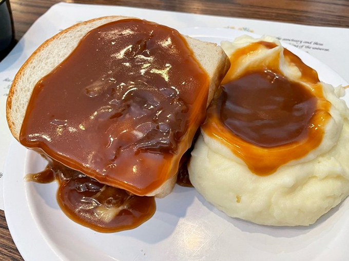 A breakfast plate that speaks the universal language of "good morning"&mdash;crispy bacon, golden scrapple, and a biscuit that could make a Southerner weep with joy. 
