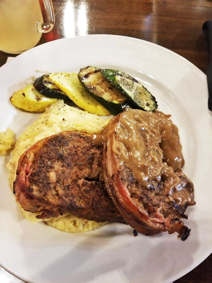This isn't your grandmother's meatloaf (though she'd approve). The caramelized exterior gives way to a tender interior that makes you question all other meatloaves you've known.