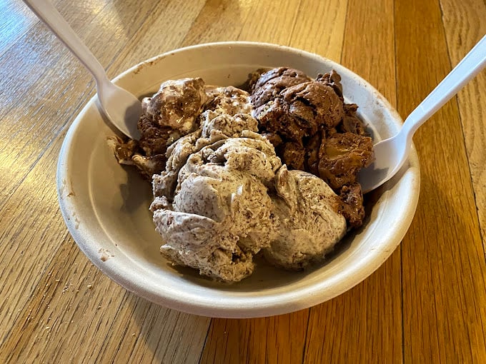 The artful sprinkle of toppings transforms this berry-swirled masterpiece into edible architecture worthy of a museum exhibit. 