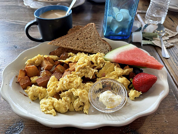 The breakfast plate that launched a thousand vacation stories&mdash;golden scrambled eggs, home fries with attitude, and fresh fruit that didn't come from a can.