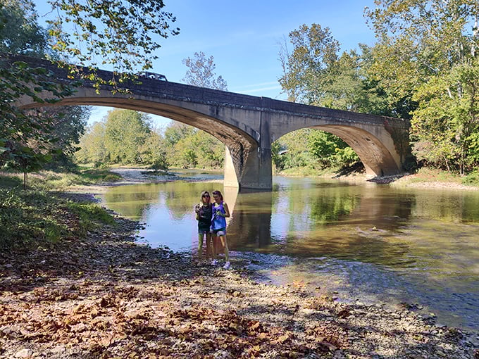 Not all treasures require admission tickets. This historic bridge frames the perfect swimming hole where local memories have been made for generations.
