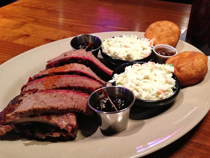 Brisket sliced so perfectly it deserves its own painting. The smoke ring is basically nature's way of applauding the pitmaster.