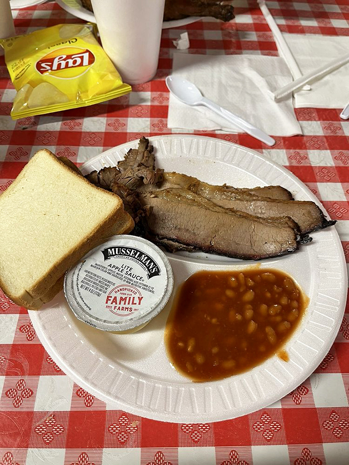 Brisket so tender it practically surrenders at the sight of your fork. That smoke ring isn't just color&mdash;it's a flavor halo.