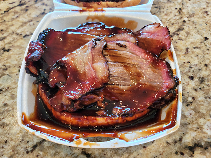Brisket with a smoke ring so perfect it could win awards. That pink edge is the barbecue equivalent of a Rolex&mdash;a sign of time well spent.
