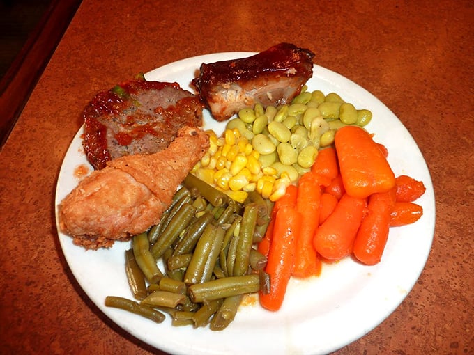 The plate that answers the eternal question: "Can I fit one more bite?" A symphony of comfort foods that would make your cardiologist wince and your soul sing.