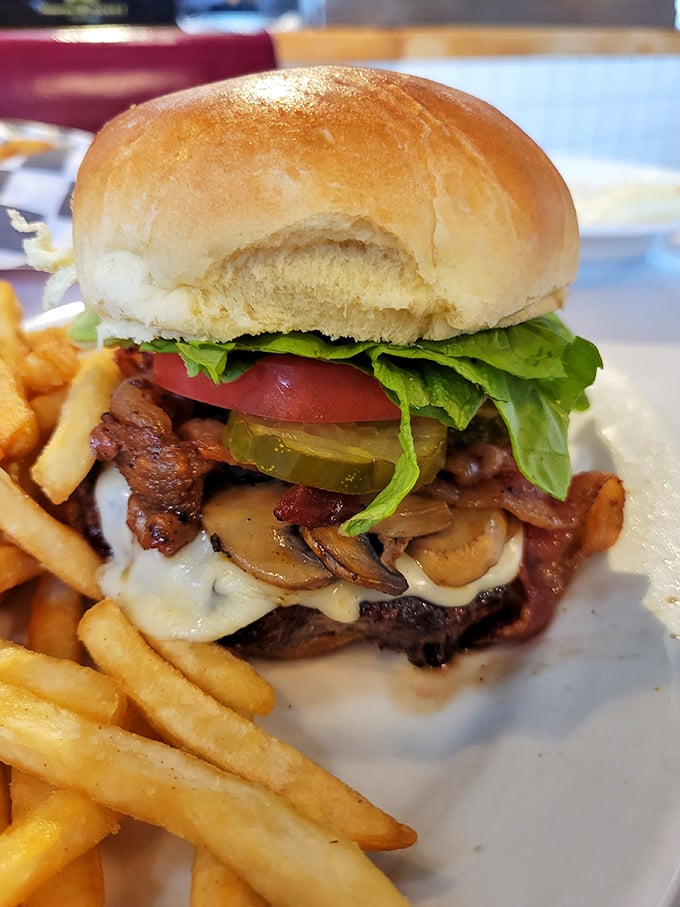 Behold the Summit Burger in all its glory &ndash; mushrooms, bacon, and melted cheese cascading down the sides. Diet starts tomorrow, folks.