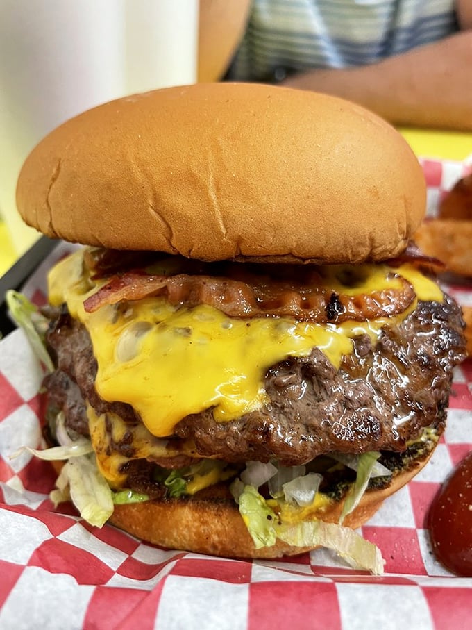 This isn't just a burger; it's a masterpiece of balance. The perfect ratio of beef to cheese to fresh toppings, all on a perfectly toasted bun.