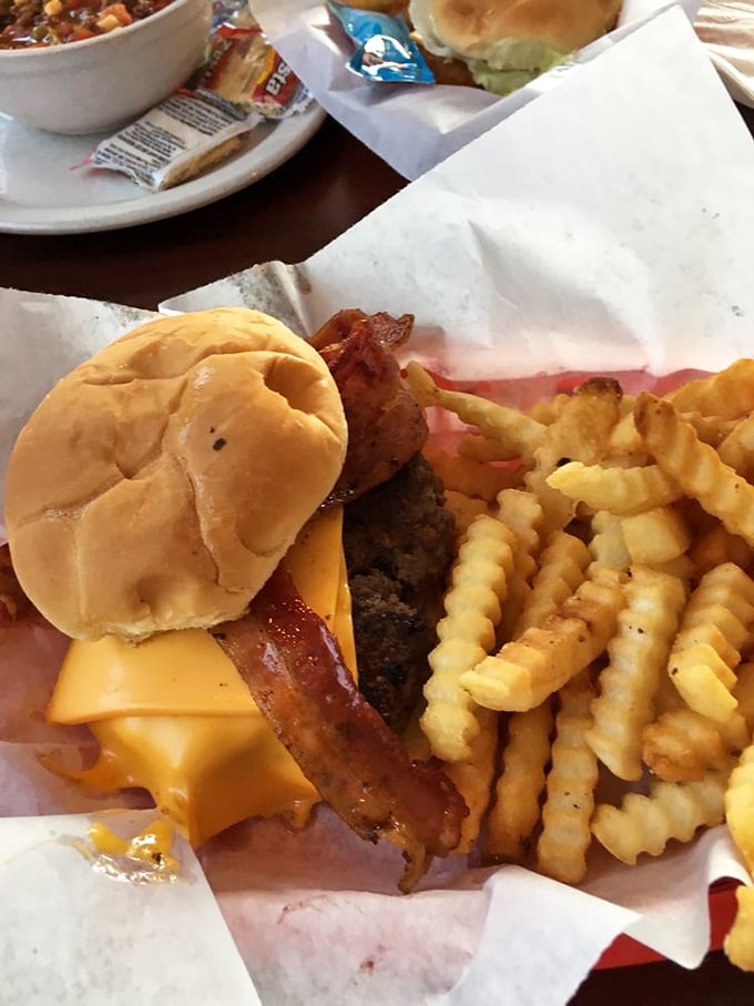This isn't just a cheeseburger&mdash;it's a masterclass in American classics with those crinkle-cut fries playing the perfect supporting role to the bacon-cheese headliner.