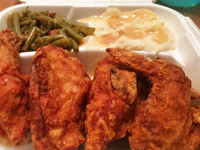 A symphony of textures: crispy chicken, tender green beans, and creamy mashed potatoes with gravy. The holy trinity of comfort food.
