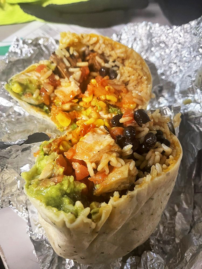 Architecture that matters. Perfectly layered rice, protein, and fresh toppings create the structural integrity engineers dream about.