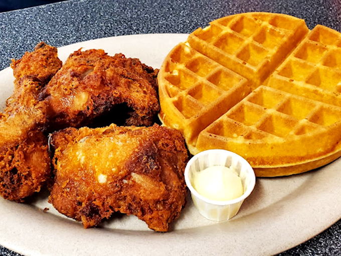Whoever first paired fried chicken with waffles deserves a Nobel Prize. Sweet meets savory in this plate of pure genius.