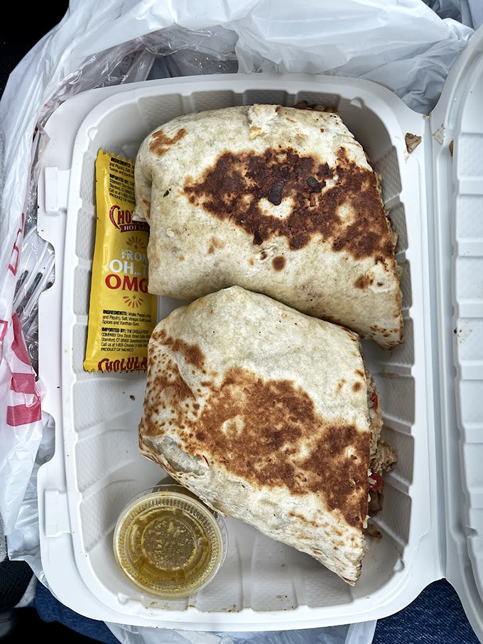 The chicken burrito arrives like a gift from the culinary gods&mdash;beautifully charred exterior giving way to a symphony of textures and flavors inside.