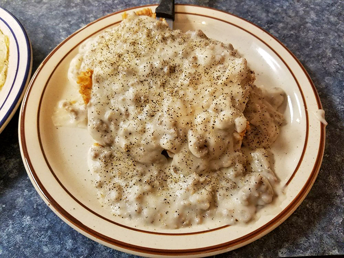 Gravy so peppery and rich it could run for mayor of Flavortown. The chicken fried steak hiding underneath doesn't stand a chance.