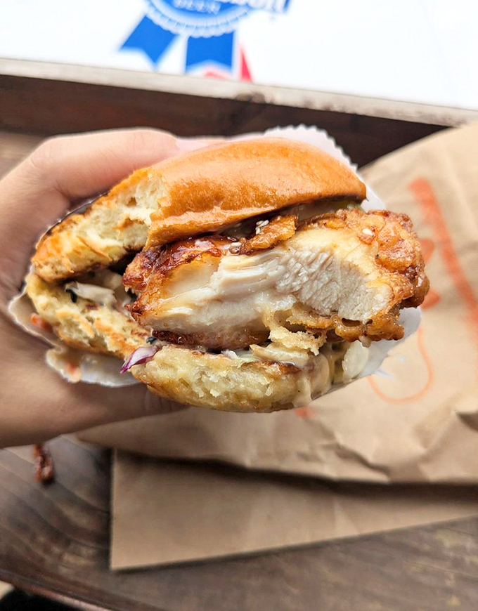 Behold the cross-section of perfection: juicy chicken with a shattering crust that makes potato chips sound like library whispers.