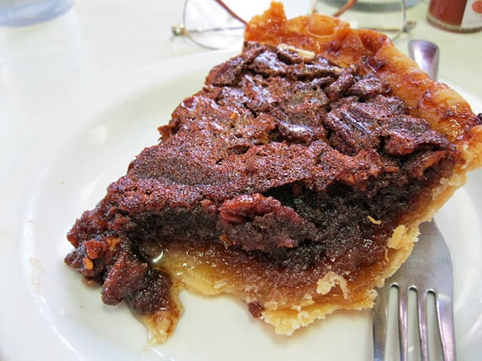 Chocolate pecan pie so decadent it should come with a warning label: "May cause involuntary food moans and temporary inability to share."