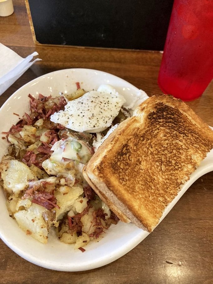 The CBH in all its glory&mdash;where perfectly seasoned corned beef meets golden potatoes and a sunny-side egg that's just waiting to create that natural sauce.