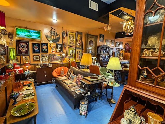 Even the seating areas tell stories. That vintage couch has probably heard more secrets than a small-town barber shop.