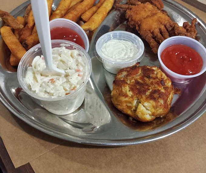 The Captain's Platter doesn't mess around—crab cake, fried oysters, and fries create the seafood equivalent of a greatest hits album.