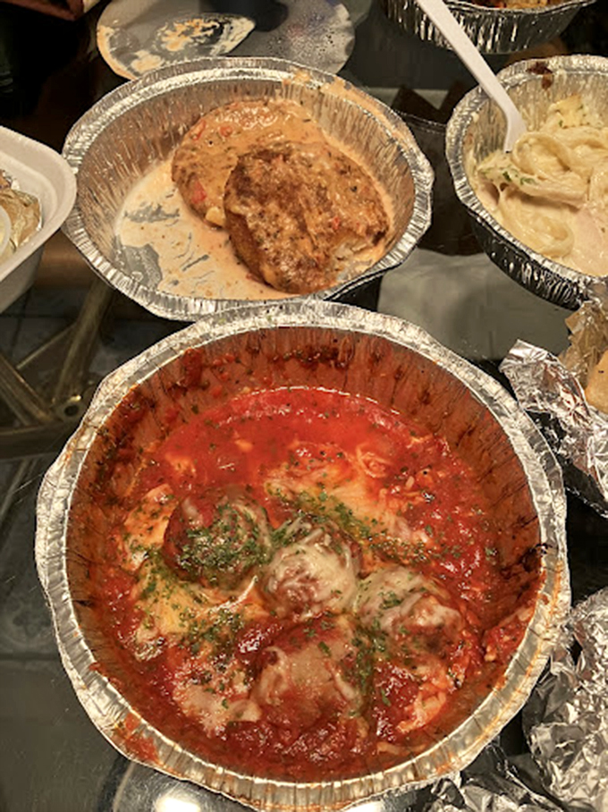 The holy trinity of comfort: crab cakes bathed in creamy sauce, meatballs swimming in marinara, and pasta that's clearly not counting carbs. Diet starts tomorrow!