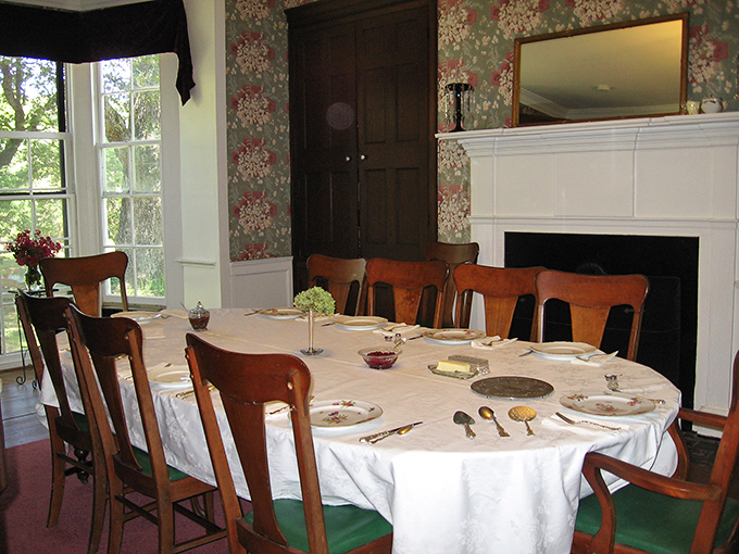 A dining table set for conversation, where Virginia history is served alongside homemade biscuits and local preserves.